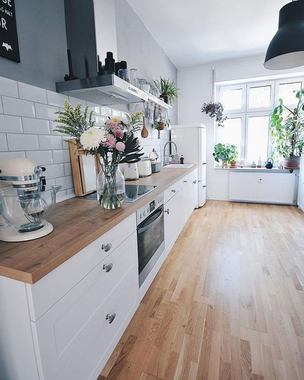 Modern boho kitchen design with wooden countertops and floors Modern boho kitchen design with wooden countertops and floors